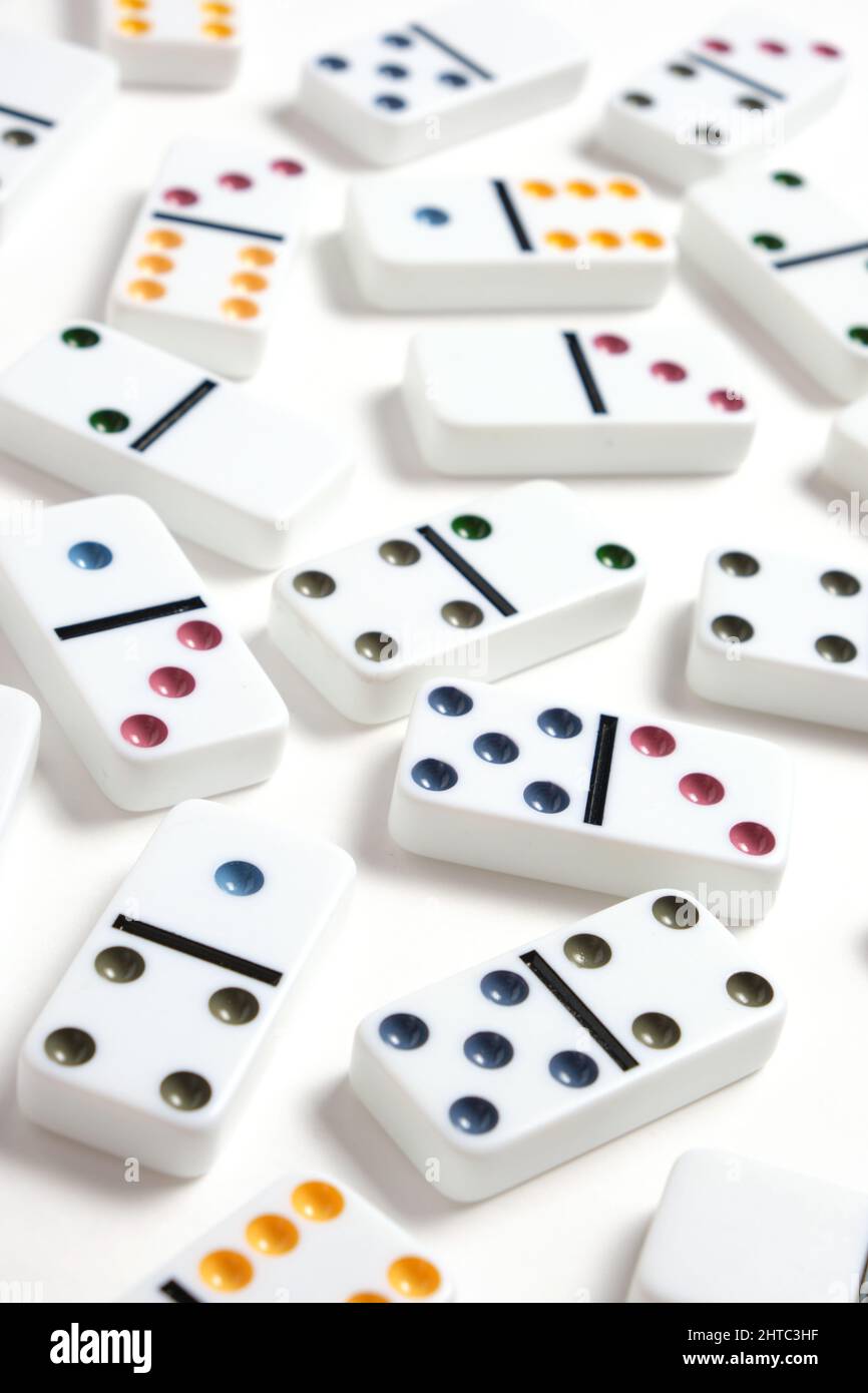 Dominoes with colorful coloring on a white background Stock Photo - Alamy