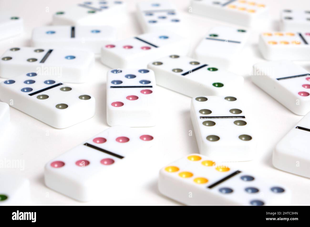 Dominoes with colorful coloring on a white background Stock Photo - Alamy