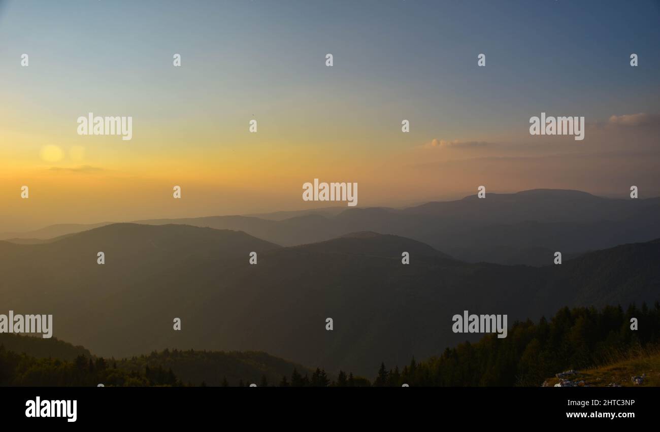 A beautiful sunset view above mountain Bukovik, near Sarajevo, Bosnia ...