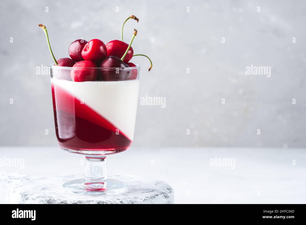 Delisious panna cotta summer dessert with cherries and cherry jelly ...