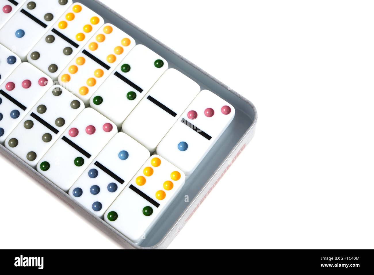 Dominoes with colorful coloring white background in package Stock Photo ...