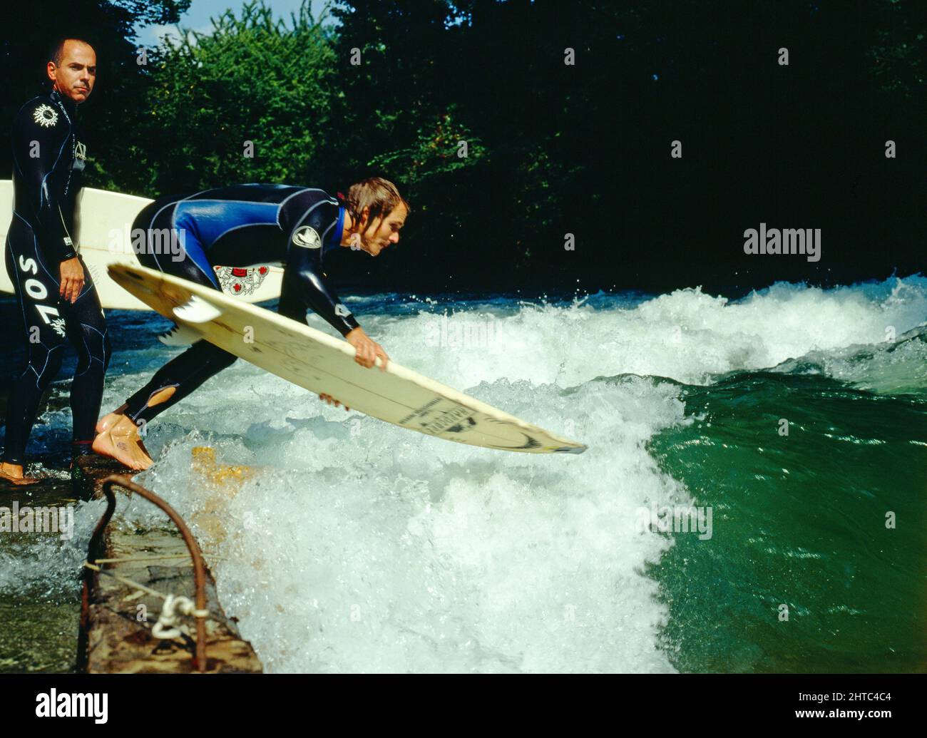 Board Surfers at the Eisbach, Isar River, Munich, Upper Bavaria ...