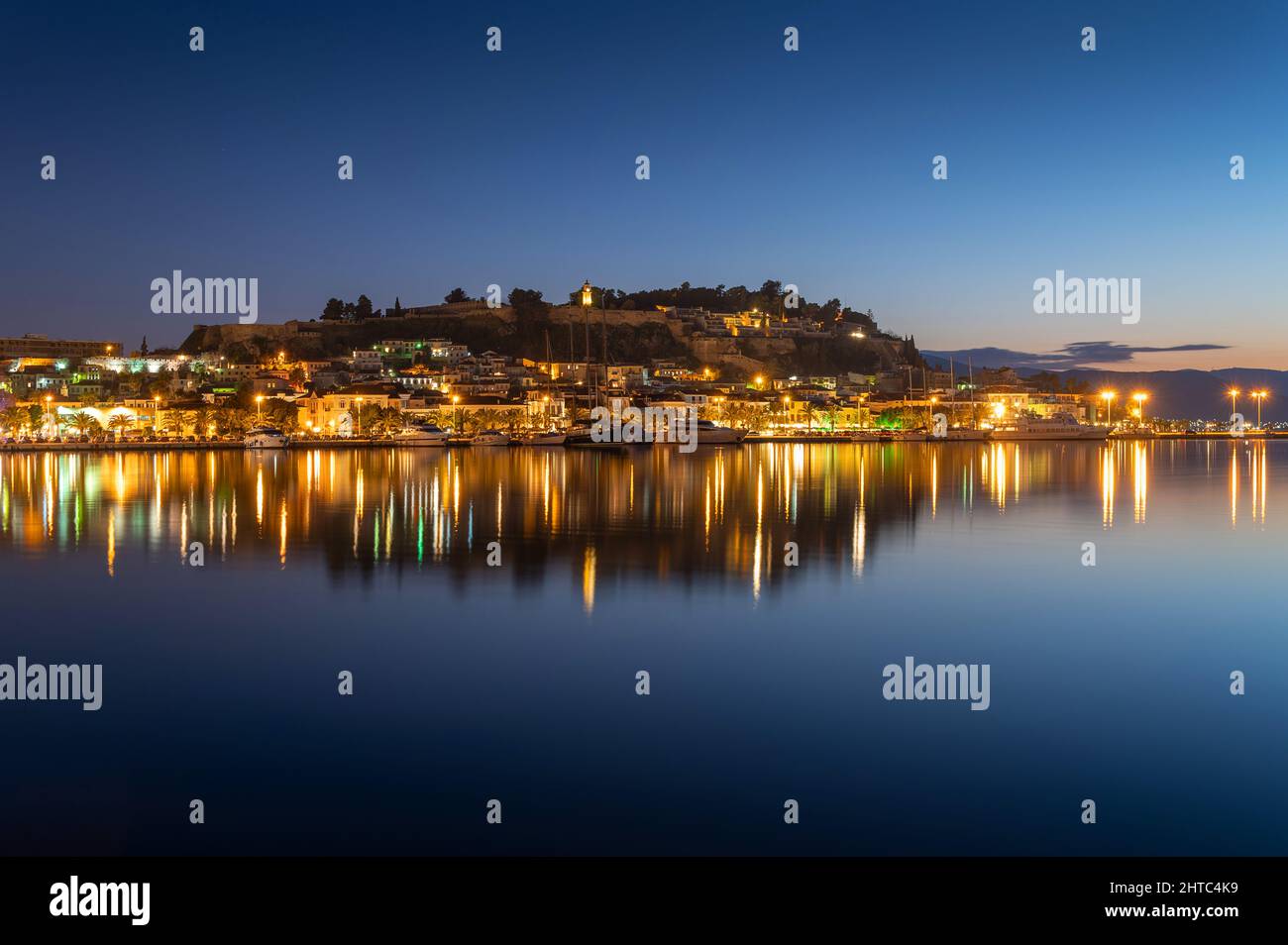 Lights in the old town of Nafplio, Greece at dusk. Nafplio was the ...