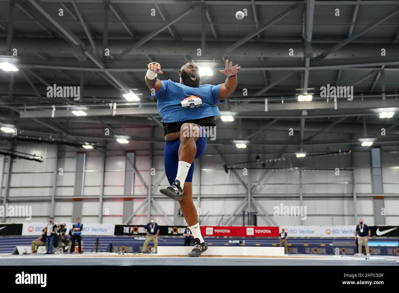 Darrell Hill competes in the shot put during the USA Indoor ...