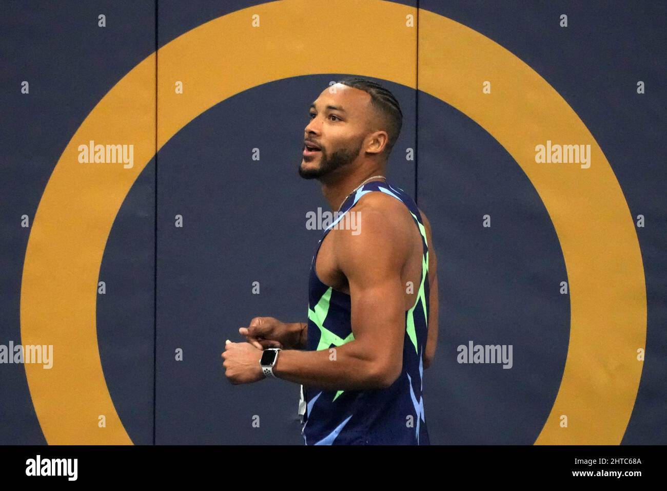 Garret Scantling reacts after running 6.86 for the top time in the ...