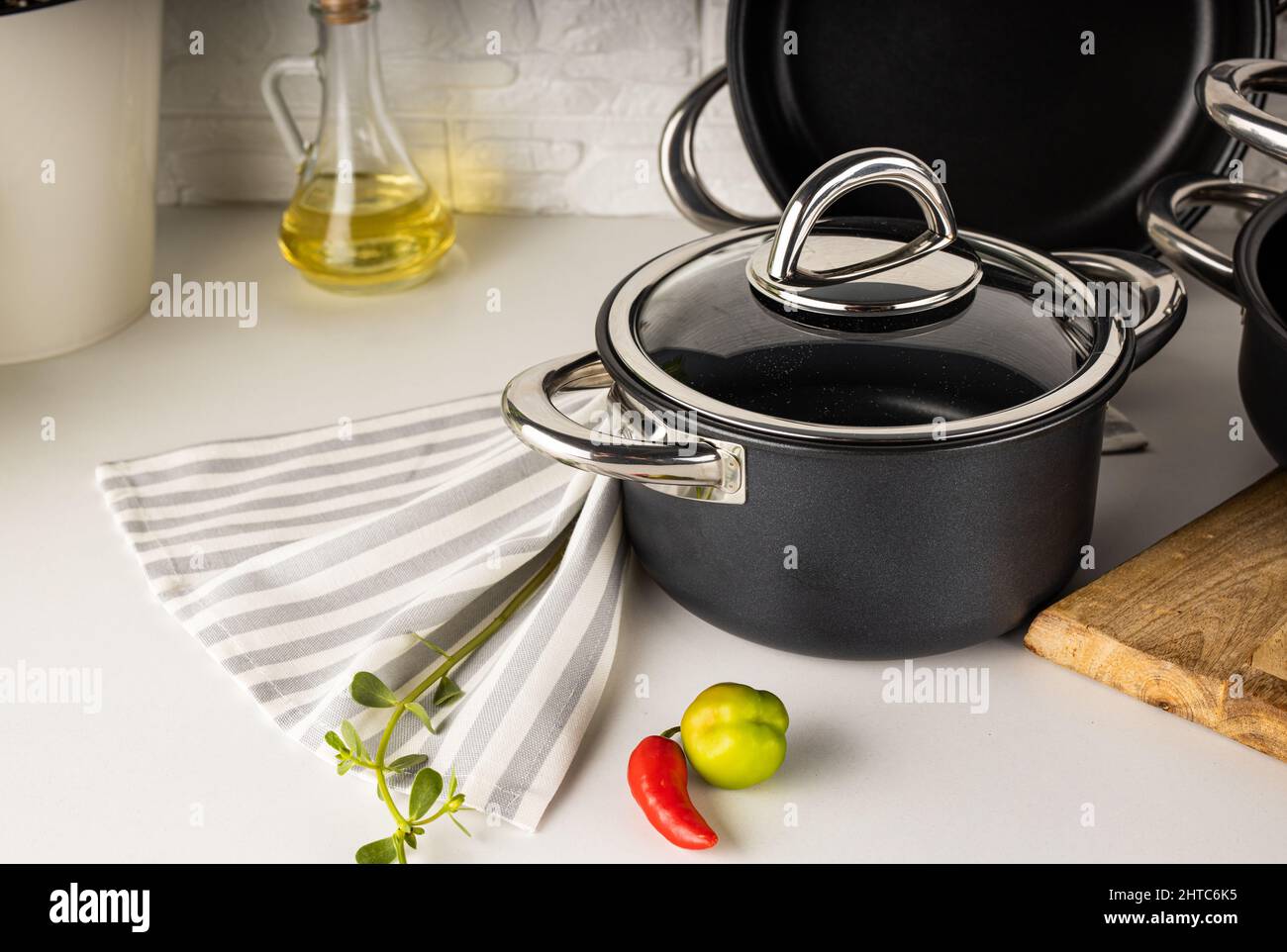 Angle shot of a cooking pot on a white surface Stock Photo - Alamy
