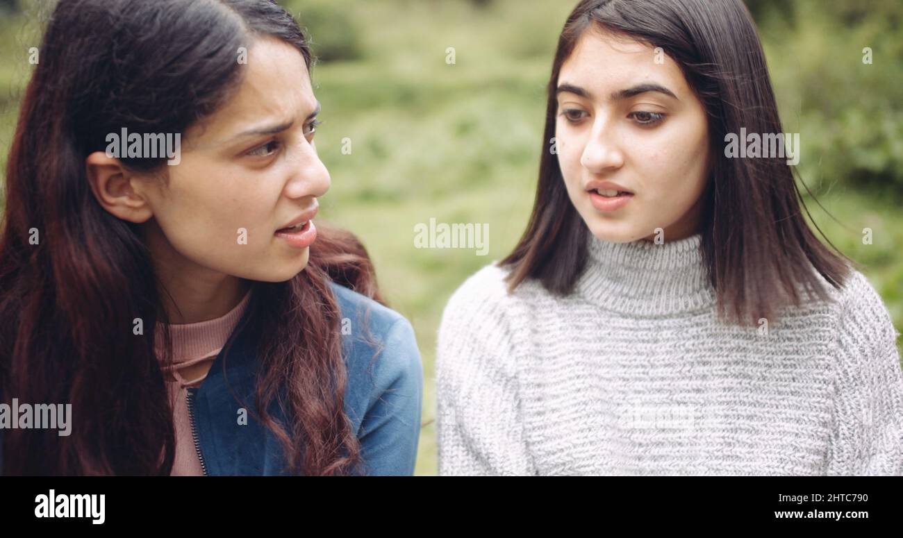 Young friends talking in the forest during the daytime Stock Photo - Alamy