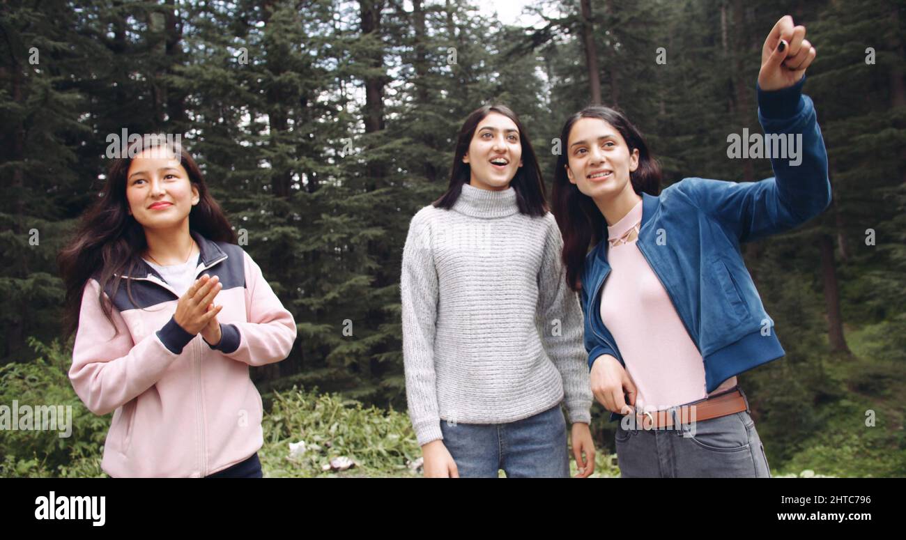 Indian friends having fun in the forest Stock Photo - Alamy