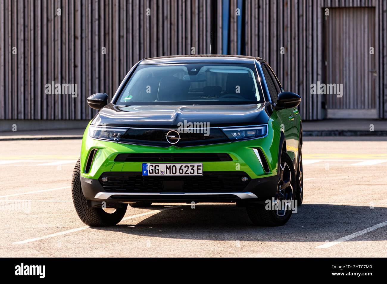 Riga, Latvia - 26 March, 2021: green electric vehicle Opel Mokka-e in ...