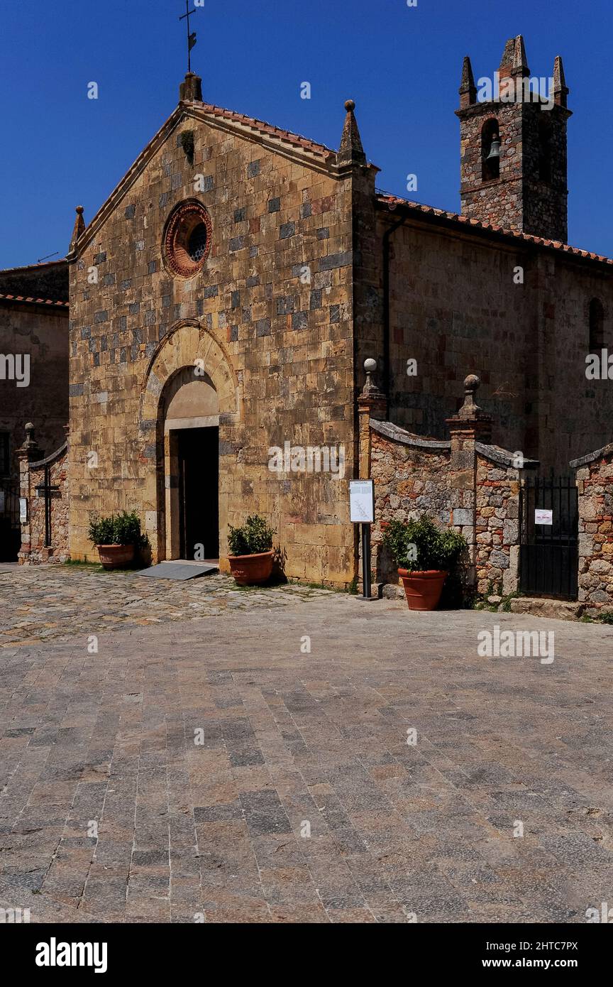 A round oculus rimmed by sculpted terracotta pierces the golden ...