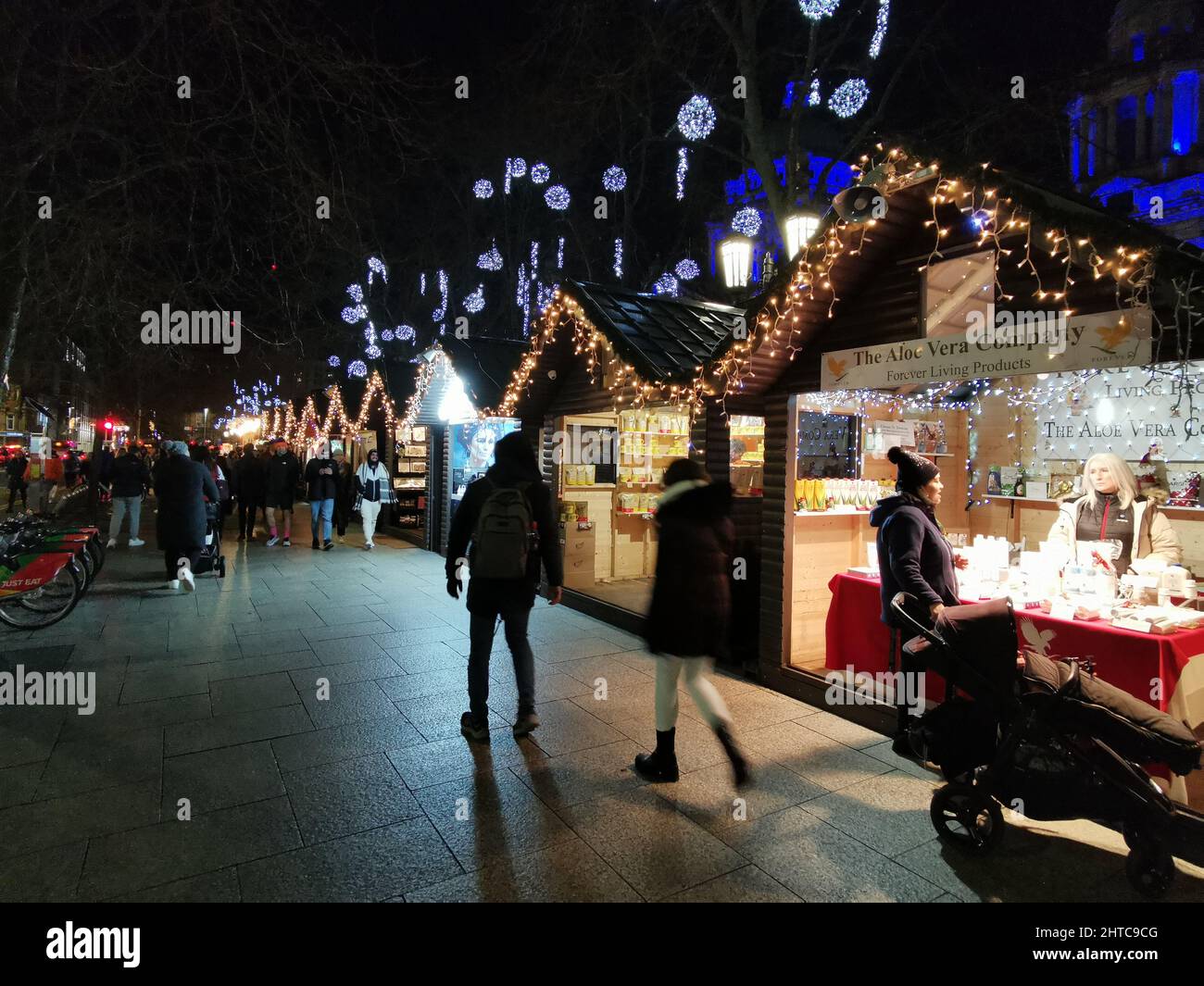 Beautiful booths at a Christmas market at night in Belfast, UK Stock ...