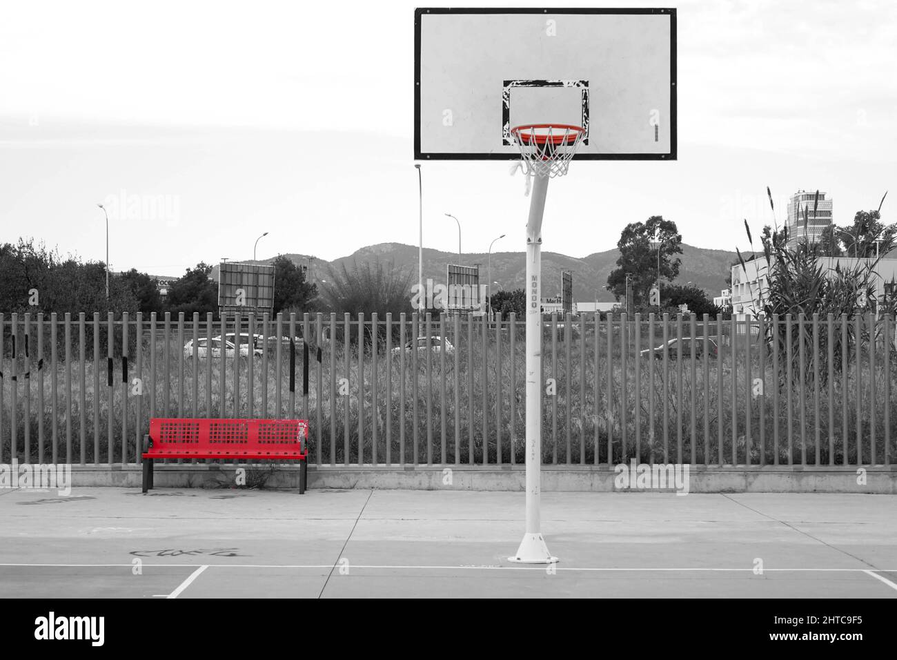 View of a red bench in a basketball court Stock Photo - Alamy