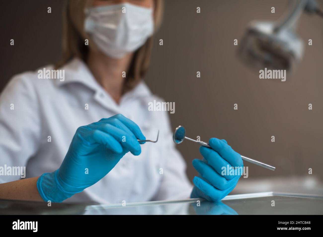 Female dentist closeup instruments hi-res stock photography and images ...