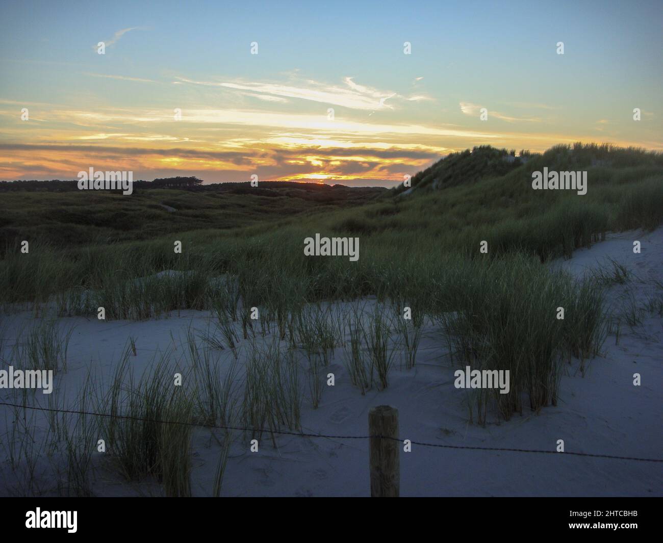 A beautiful view of a sandy field with cloudy sky background Stock ...