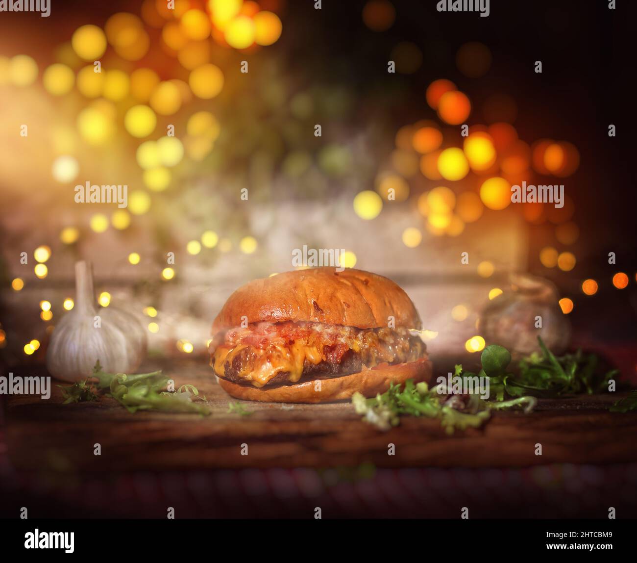 delicious and tasty burger with cheese and lettuce Stock Photo - Alamy