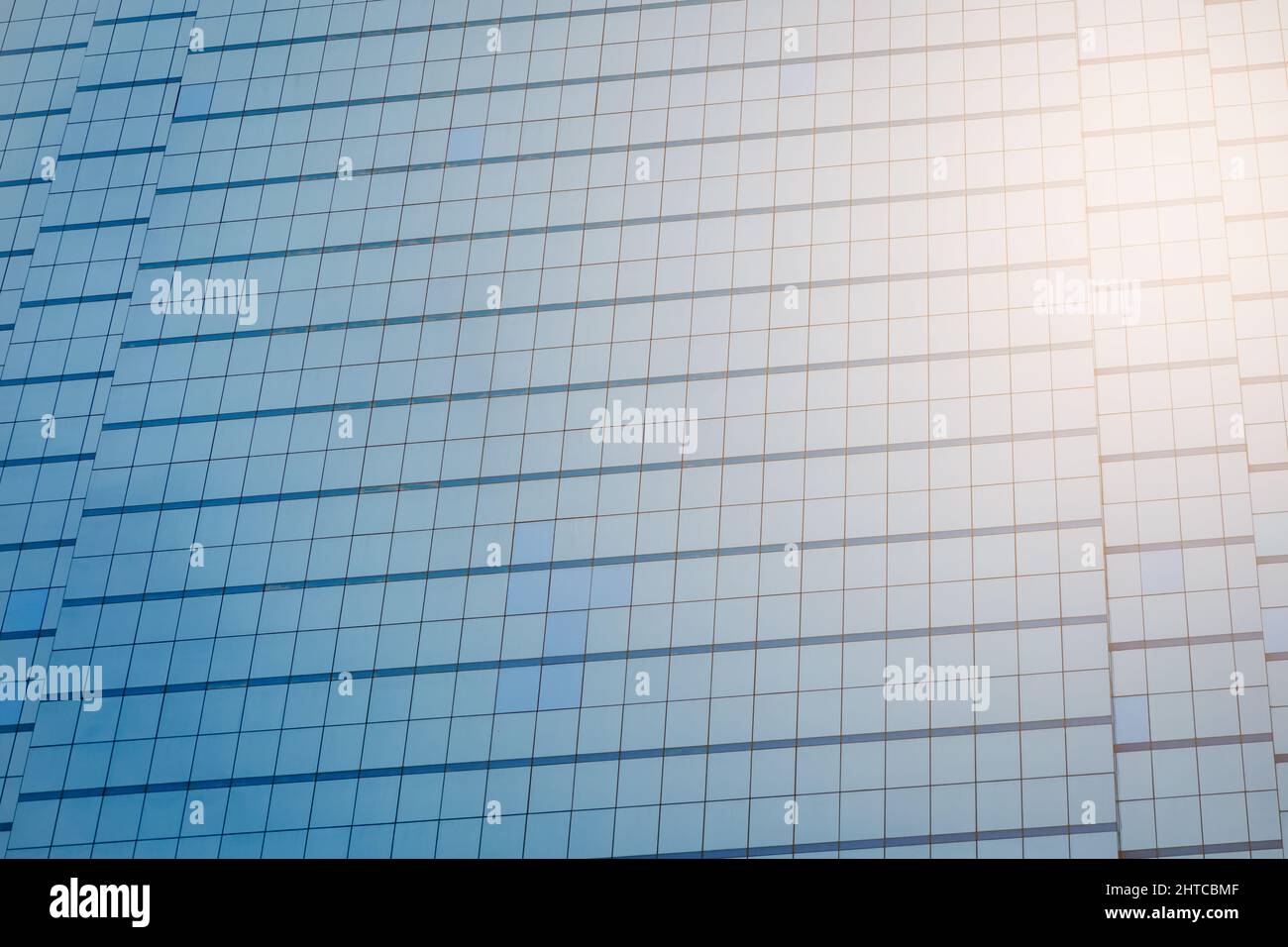 Blue glass windows of office building for background Stock Photo - Alamy