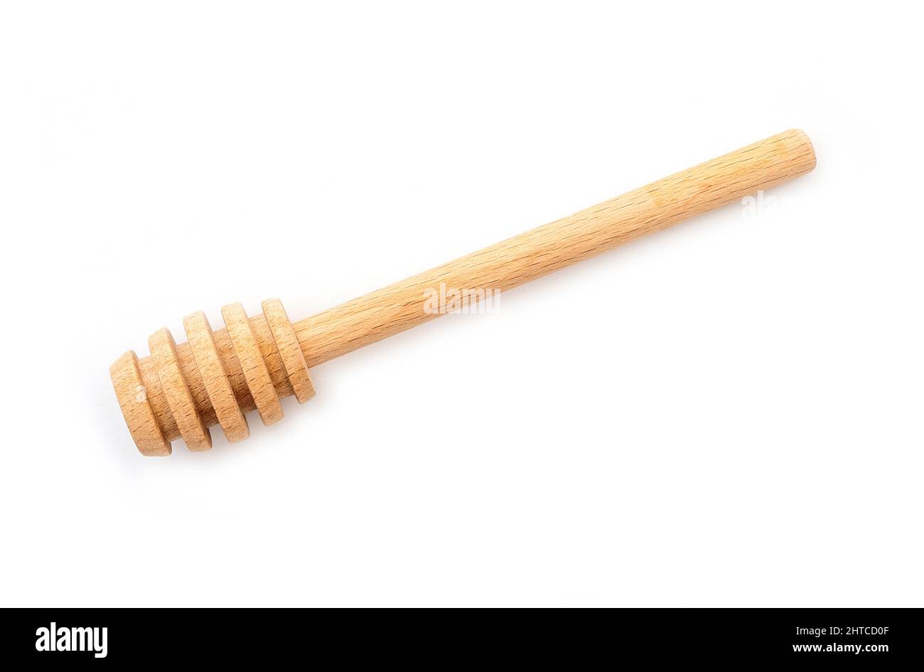 Honey dipper spoon isolated on white Stock Photo - Alamy