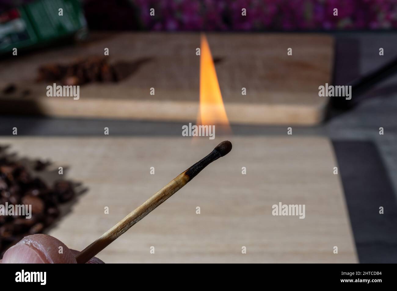 Selective shot of a hand holding burning matchstick Stock Photo - Alamy