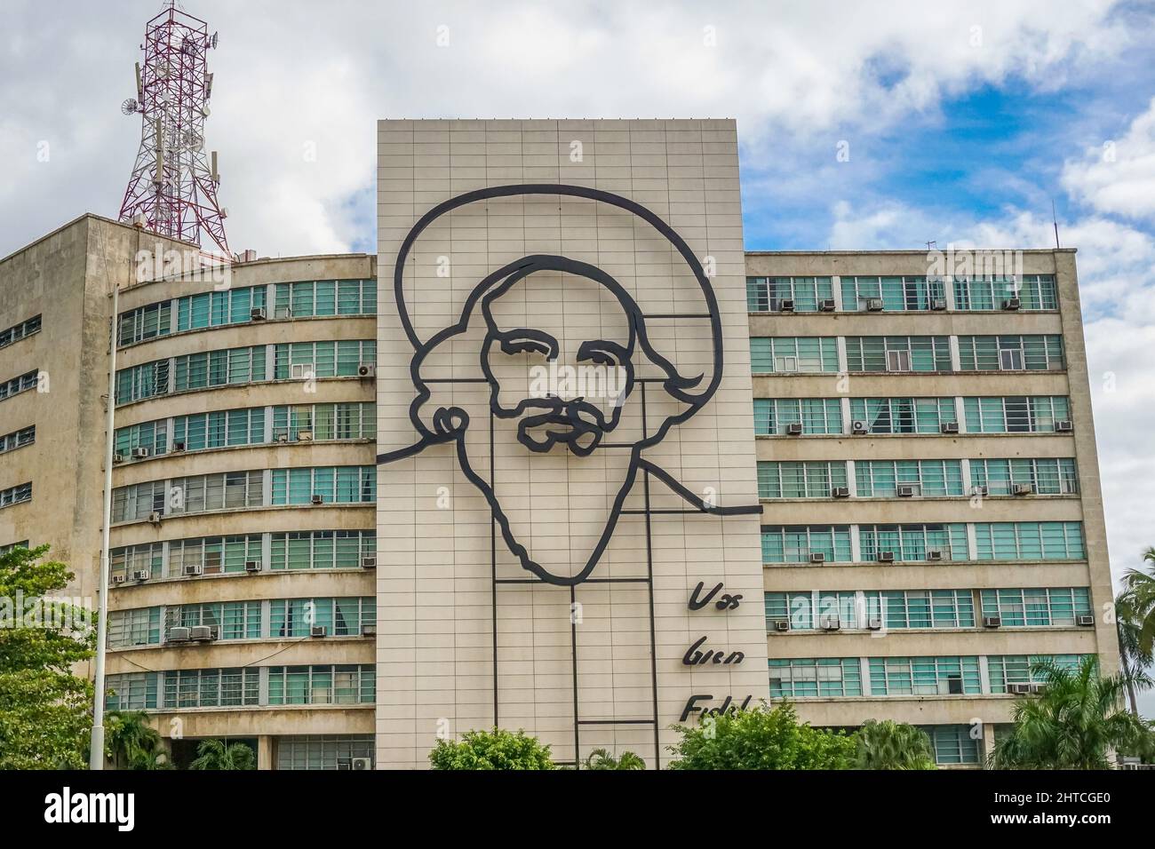 Building with Fidel Castro's portrait on the wall at Plaza de la ...