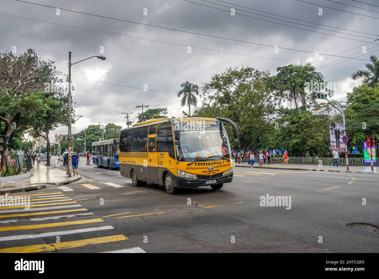 Buses in the street with walking people in Havana, Cuba Stock Photo - Alamy