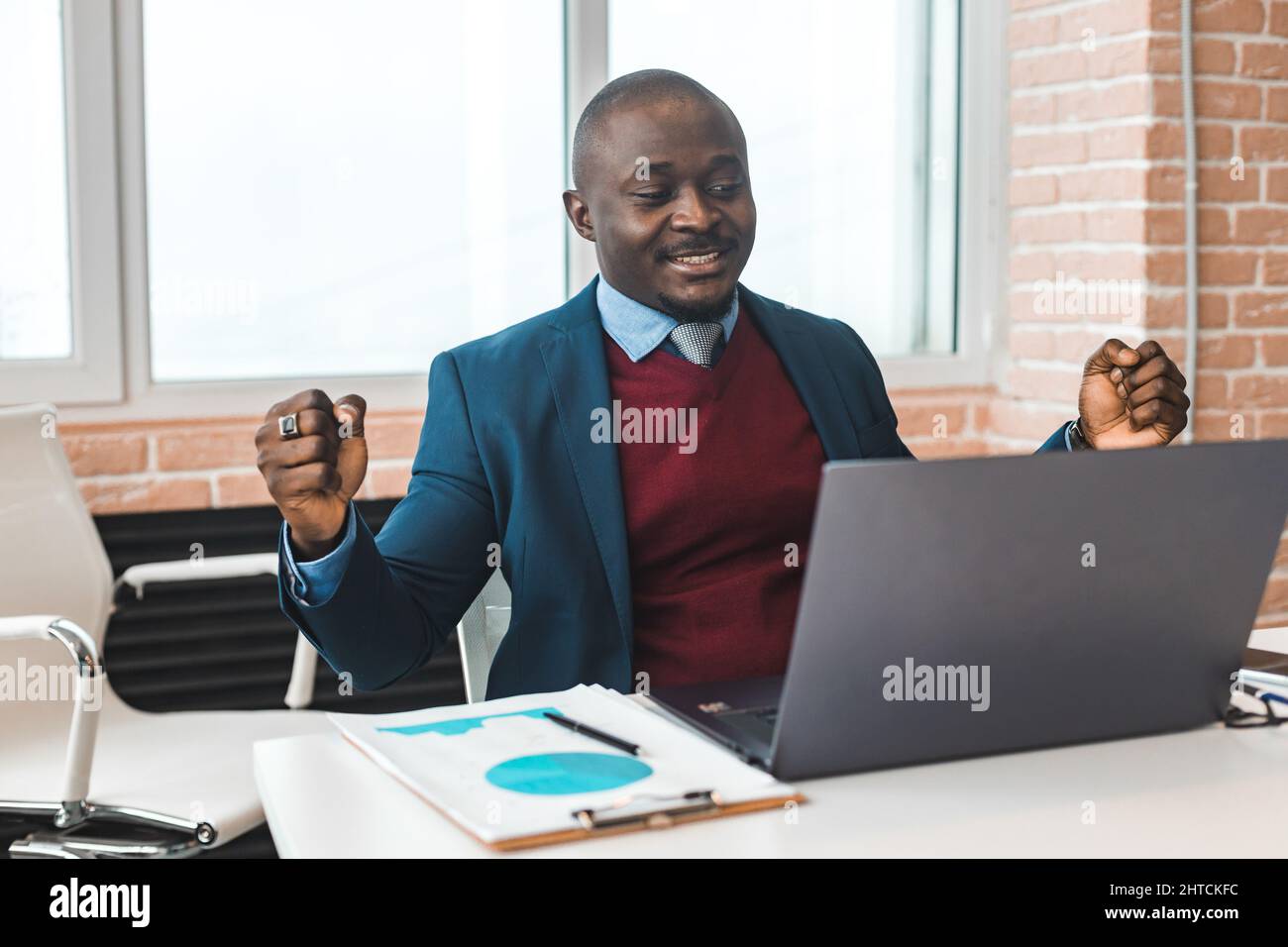 Portrait of an African American in the office. Black man in a business ...
