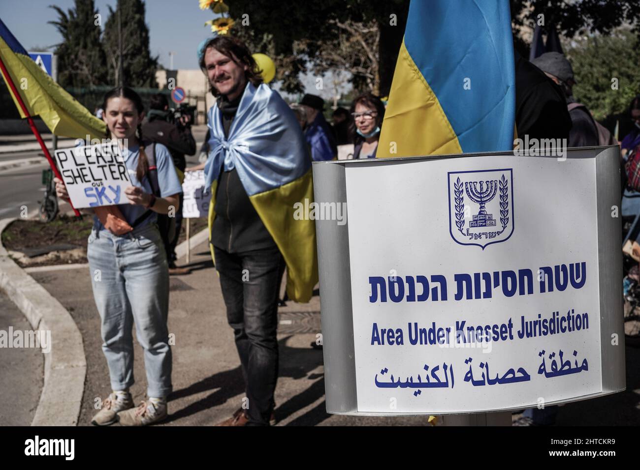Jerusalem, Israel. 28th Feb, 2022. Protesters hold flags and placards ...