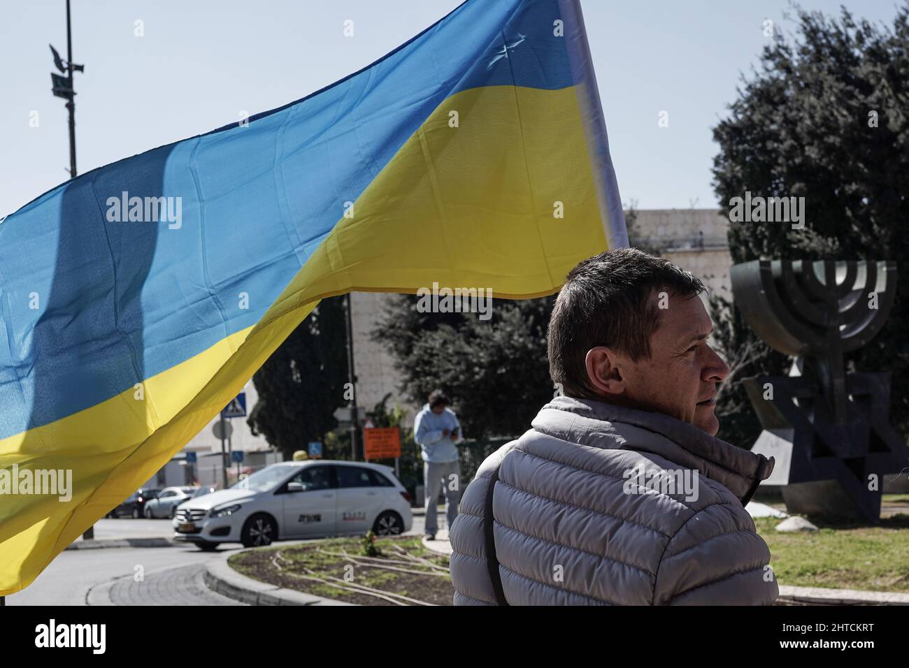 Jerusalem, Israel. 28th Feb, 2022. Protesters hold flags and placards ...