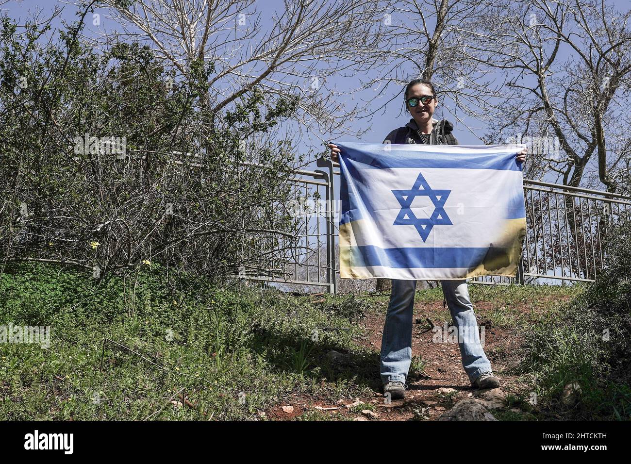 Jerusalem, Israel. 28th Feb, 2022. Protesters hold flags and placards ...
