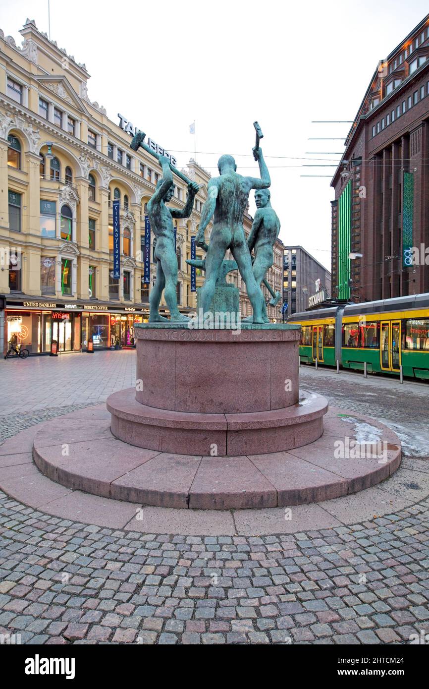 Kolmen sepän patsas (Three Smiths statue) in Helsinki, Finland Stock ...