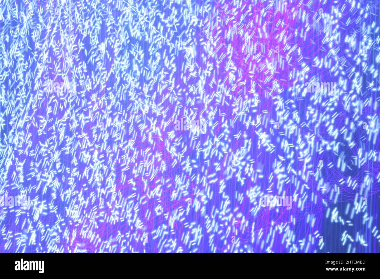 Beautiful vibrant view of many light particles sparking on light blue ...