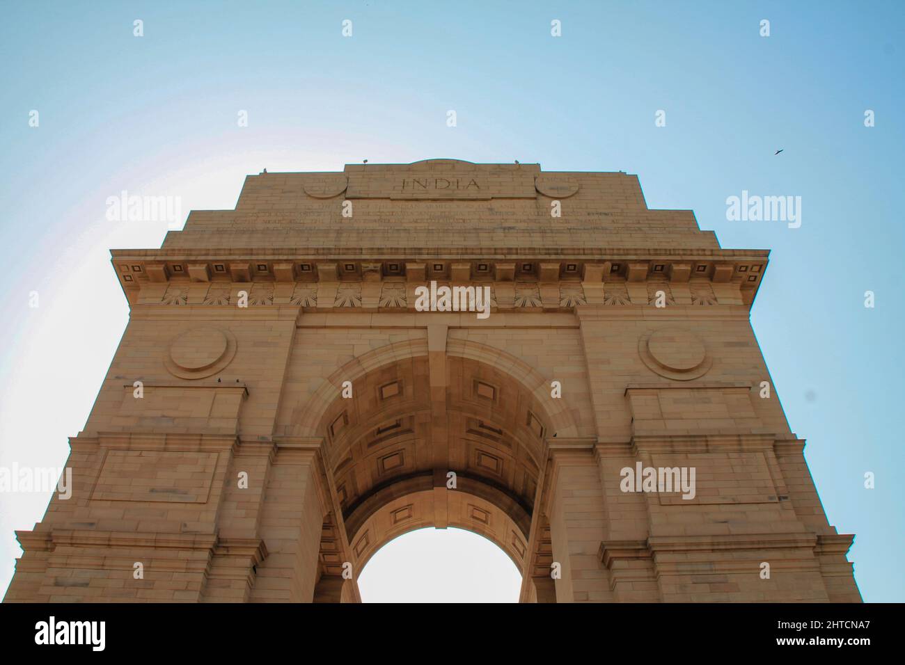 Low angle shot of the famous Indian Gate in New Delhi, India under a ...