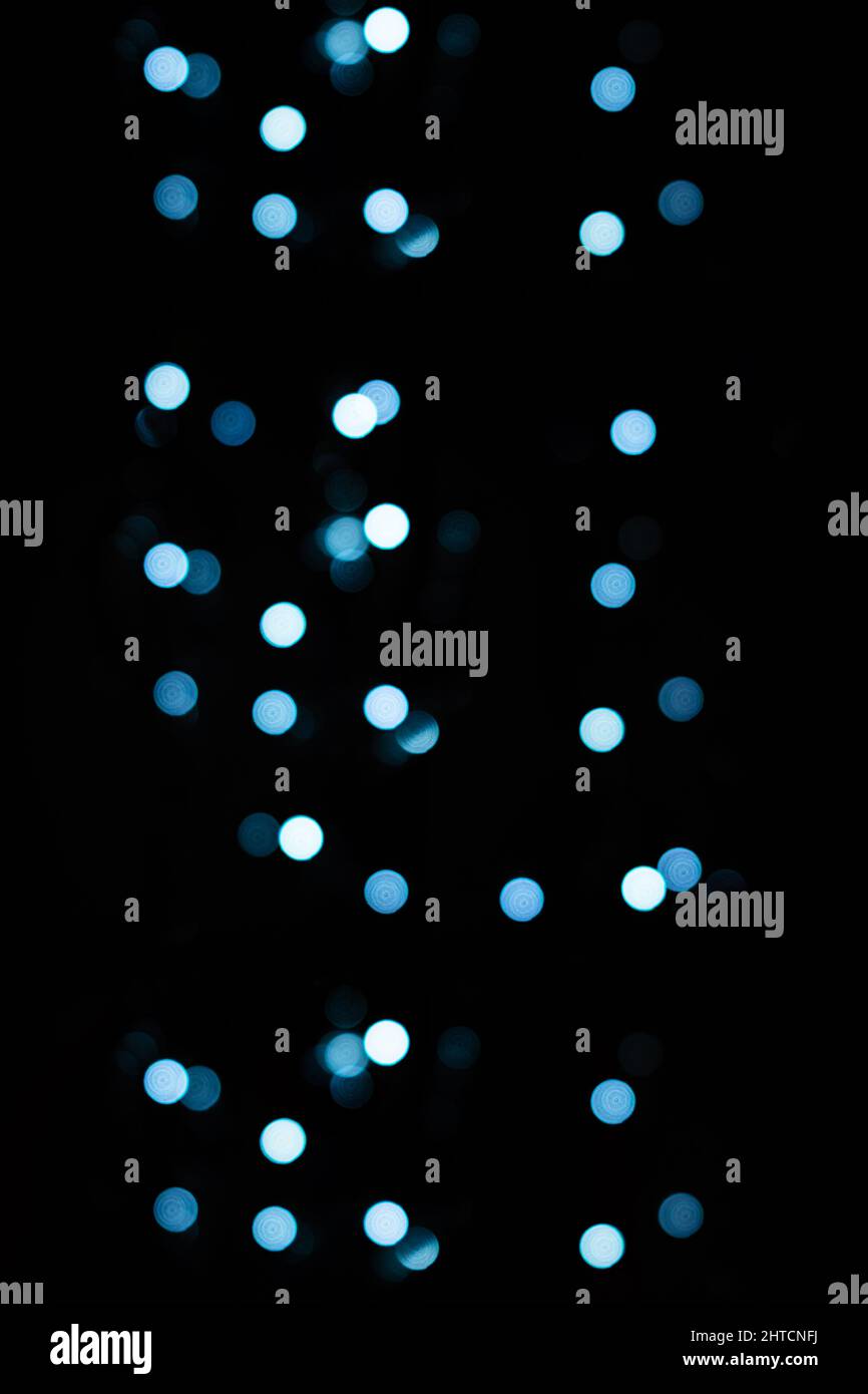 Dark blurry background with blue bokeh lights for textures and wallpapers Stock Photo - Alamy