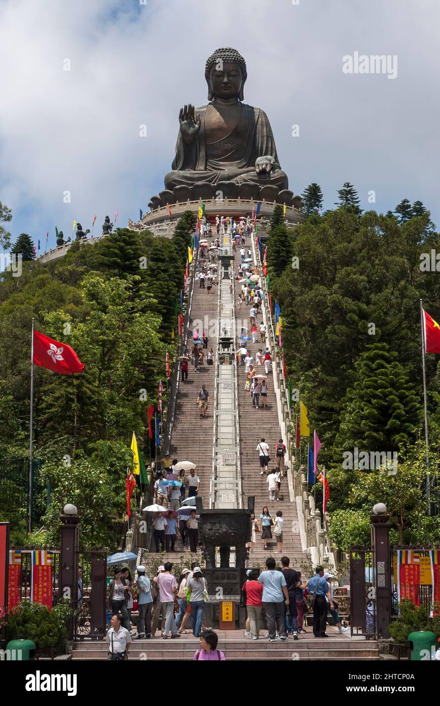Tourists climb the 268-step staircase to the Big Buddha (correct name ...