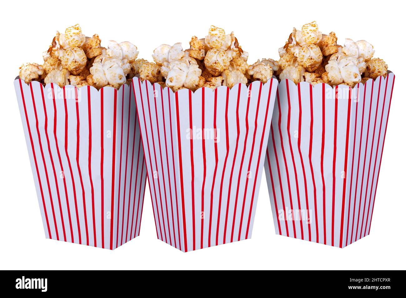 Three containers of popcorn food on a white isolated background. Red ...