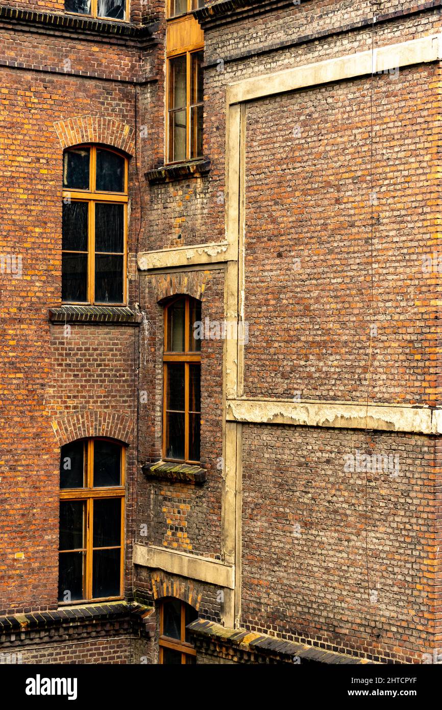 Old brick building with wooden windows Stock Photo - Alamy