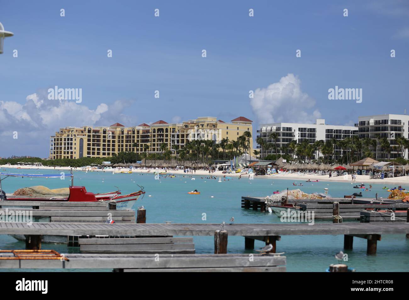 A view of the Aruba dock on the beach on a sunny morning Stock Photo ...