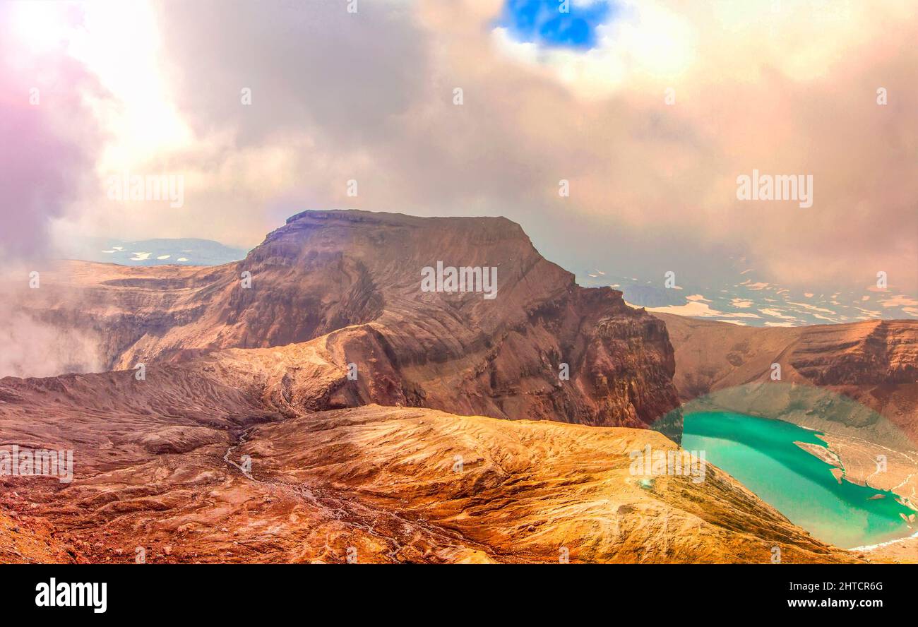 Green lake in the mouth of Gorely volcano in Kamchatka Peninsula Stock ...
