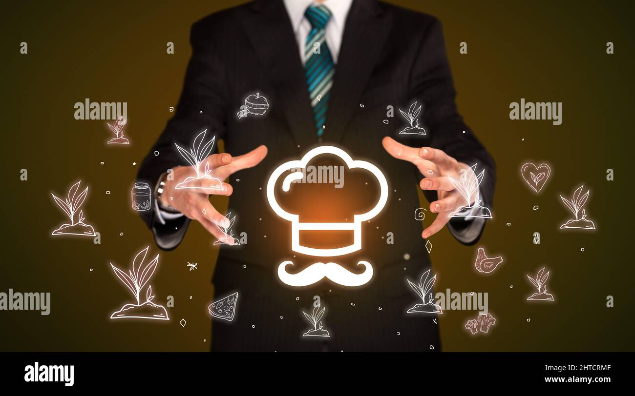 Hand holding food related icons Stock Photo - Alamy