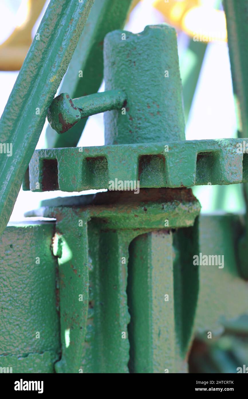 Vintage gear cogs of an old farm tractor Stock Photo - Alamy