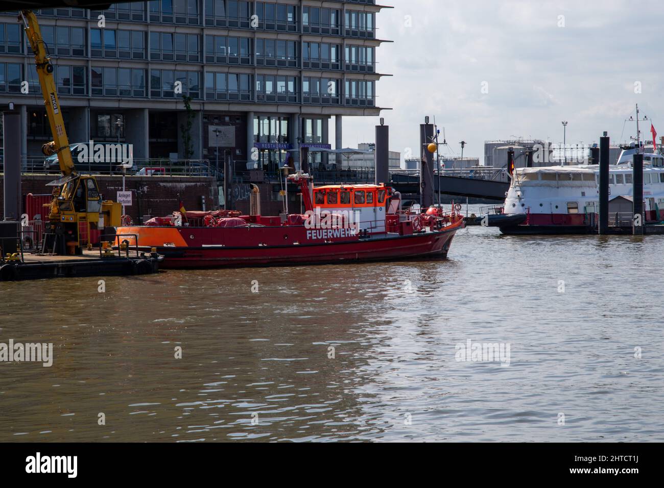 A fire department boat in the Hamburg harbor Stock Photo - Alamy