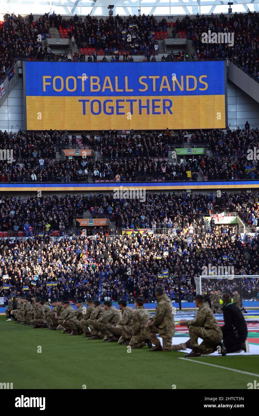 London, UK. 27th Feb, 2022. A football stands together message on the ...