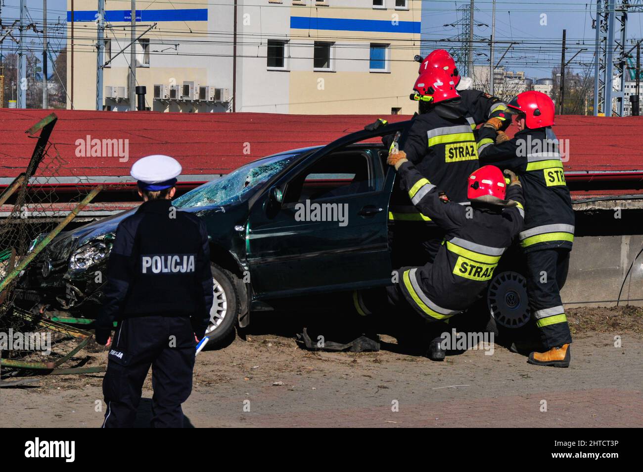 Fire brigade trying to remove car wreck from car accident place Stock ...