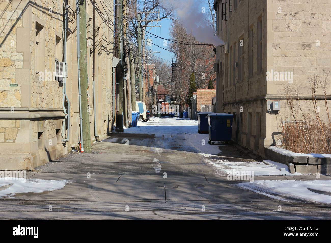 An alley winding thru the inner city neighborhood of Hyde Park in ...
