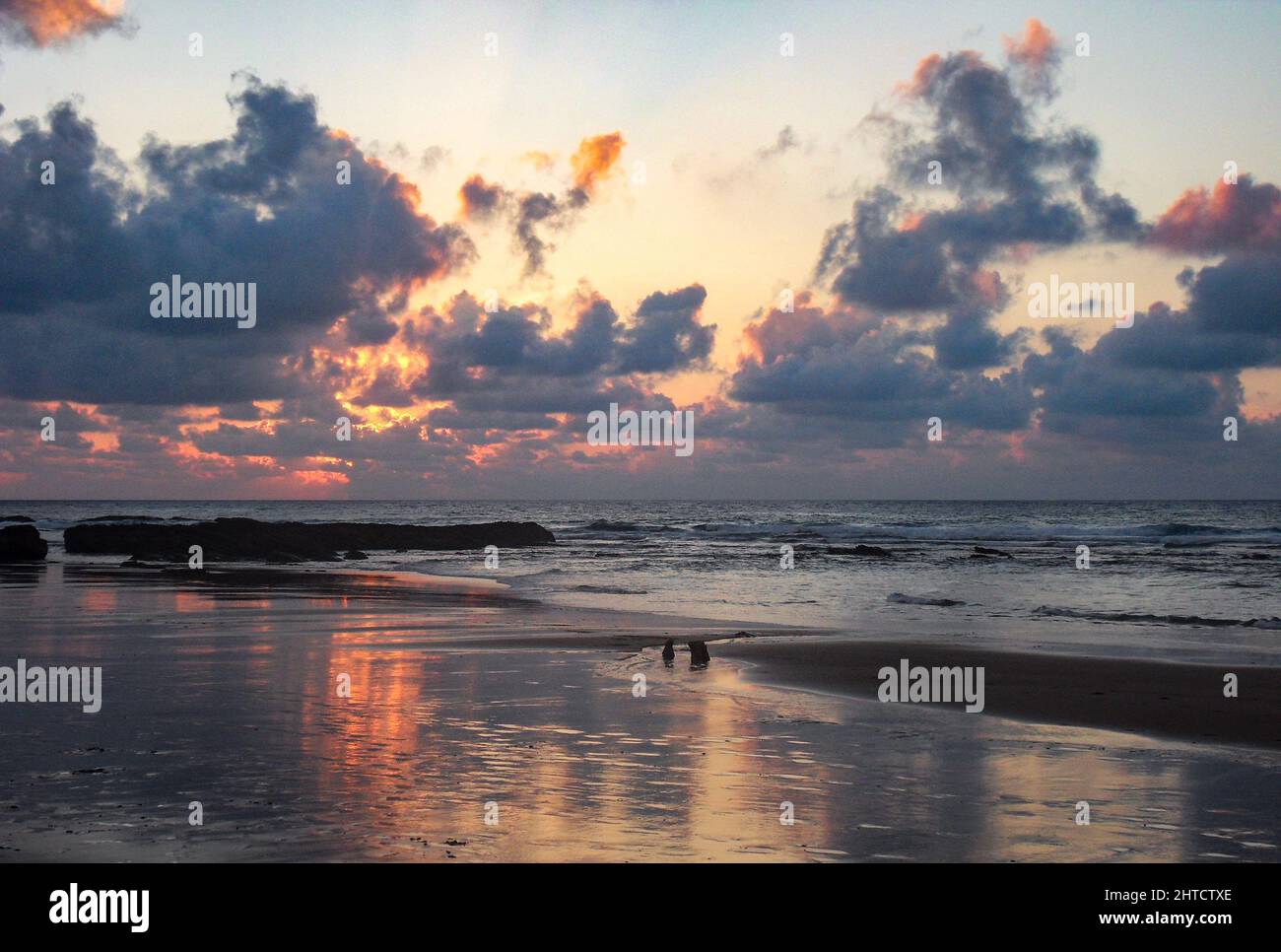 Scenic view of the Monte Clerigo Beach in Algarve, Portugal at sunset ...