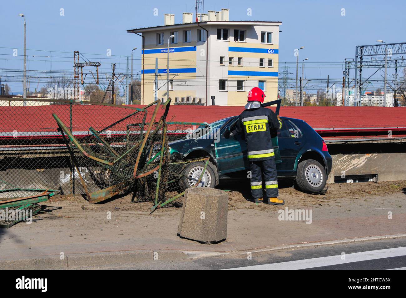 Fire brigade looking at wreck on car accident place Stock Photo - Alamy