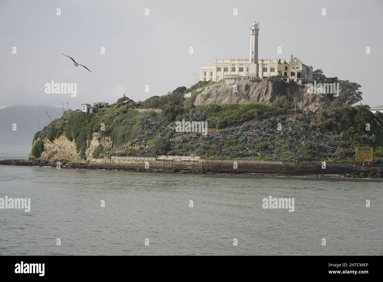 Beautiful shot of the Alcatraz Federal Penitentiary under the cloudy ...