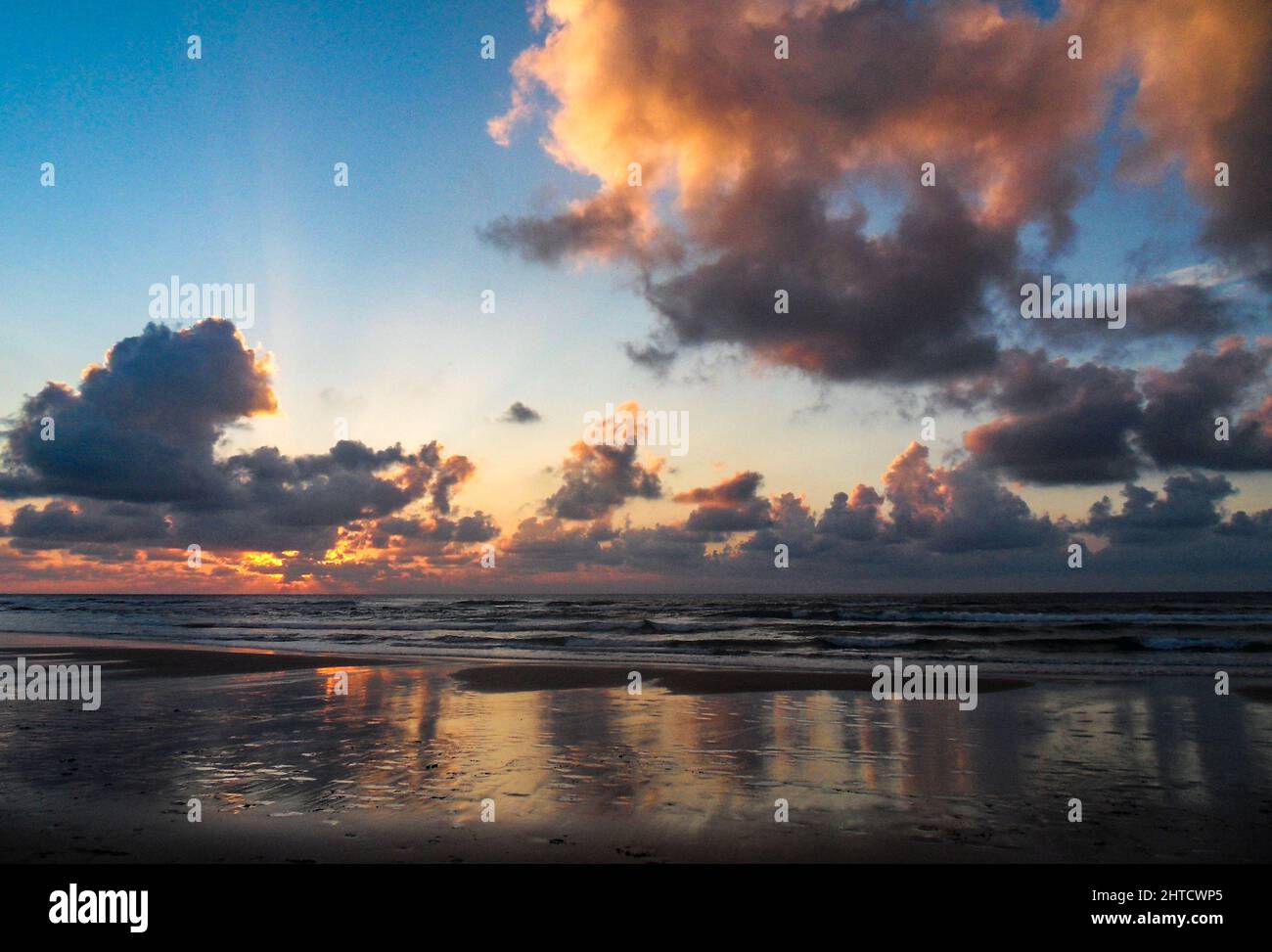 Scenic view of the Monte Clerigo Beach in Algarve, Portugal at sunset ...