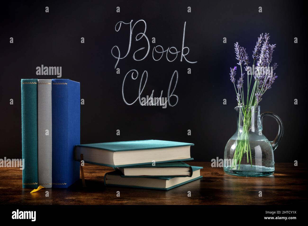 Book Club Concept. A stack of hardcover books with chalk lettering on a ...