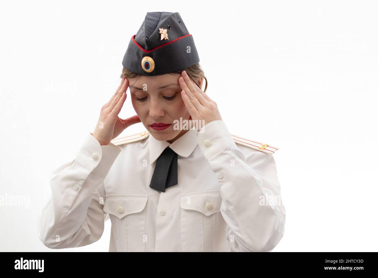 A beautiful young female Russian police officer in dress uniform in a ...