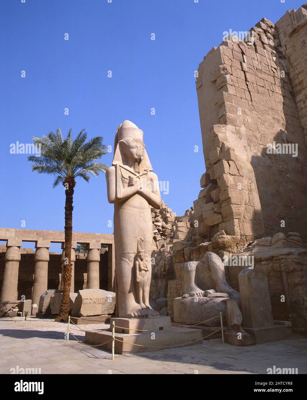 Karnak, Egypt, 1984. Ancient pharoaic figure at the Temple of Karnak, a ...
